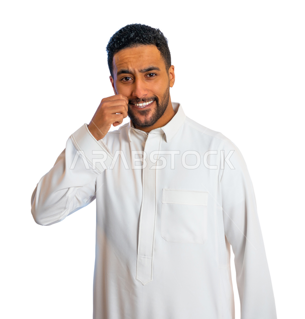 Portrait of a Saudi Arabian Gulf youth holding his mustache with ...
