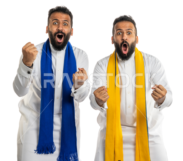 Portrait of two Saudi Arabian Gulf twin men, one wearing the Al Nasr ...