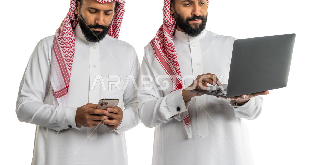 Portrait of two Saudi Arabian Gulf twin men, meeting of co-workers at ...
