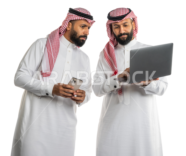Portrait of two Saudi Arabian Gulf twin men, meeting of co-workers at ...