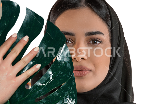 Close-up of the face of a veiled Saudi Arabian Gulf woman for a ...