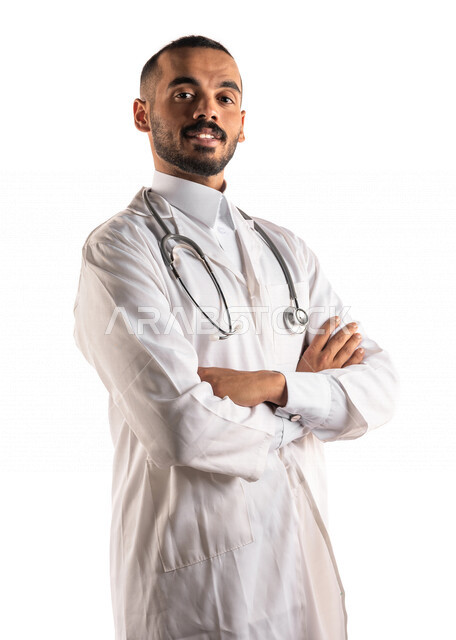 Portrait of a Saudi Arabian Gulf doctor with his hands folded, wearing ...