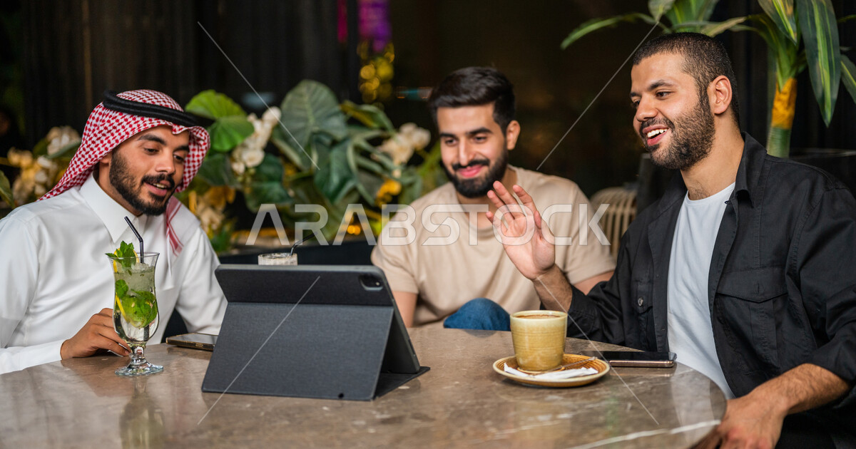 Saudi Arabian Gulf youth sitting in a cafe in the Kingdom of Saudi ...