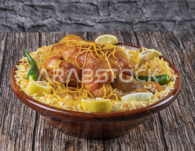 A plate of delicious mandi rice with meat, dazzling rice, traditional ...