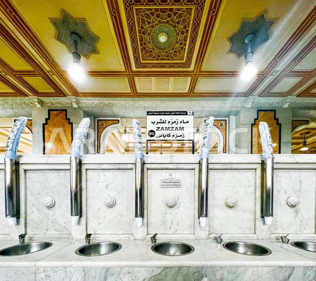 A picture of a painting of Zamzam water in Mecca Karma, a well of water ...