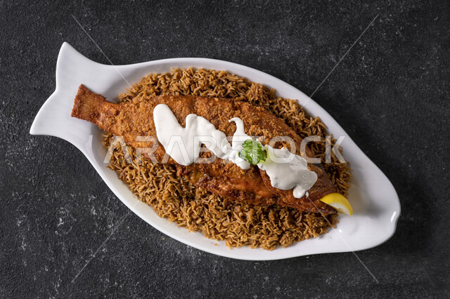 Delicious rice dish with fish, traditional Arabic food, Arab food ...