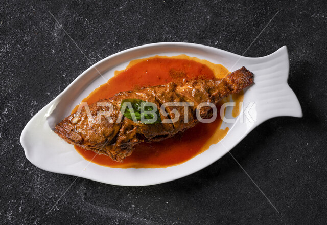 A close-up of the delicious fish dish, traditional Arabic dishes ...