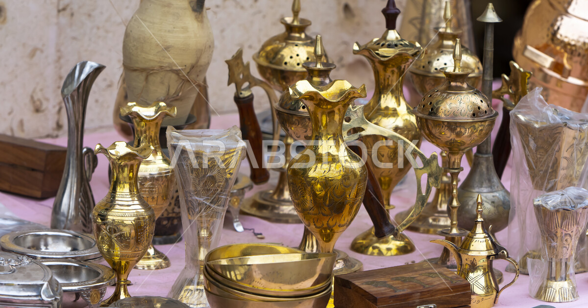 A group of ancient oriental Arab tools made of copper in a traditional ...