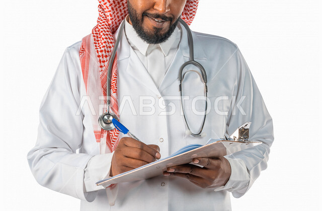 A close-up portrait of a Saudi Arabian Gulf doctor wearing a medical ...