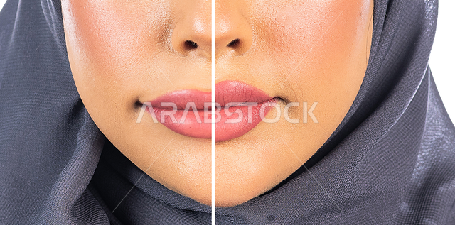 Close-up of the lower half of the face of a Saudi Arabian Gulf woman, a ...