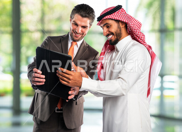 A Saudi Arabian Gulf team in a business meeting at the company’s ...