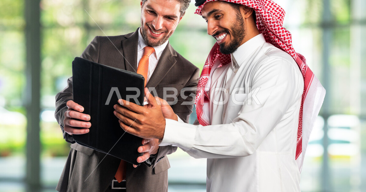 A Saudi Arabian Gulf team in a business meeting at the company’s ...