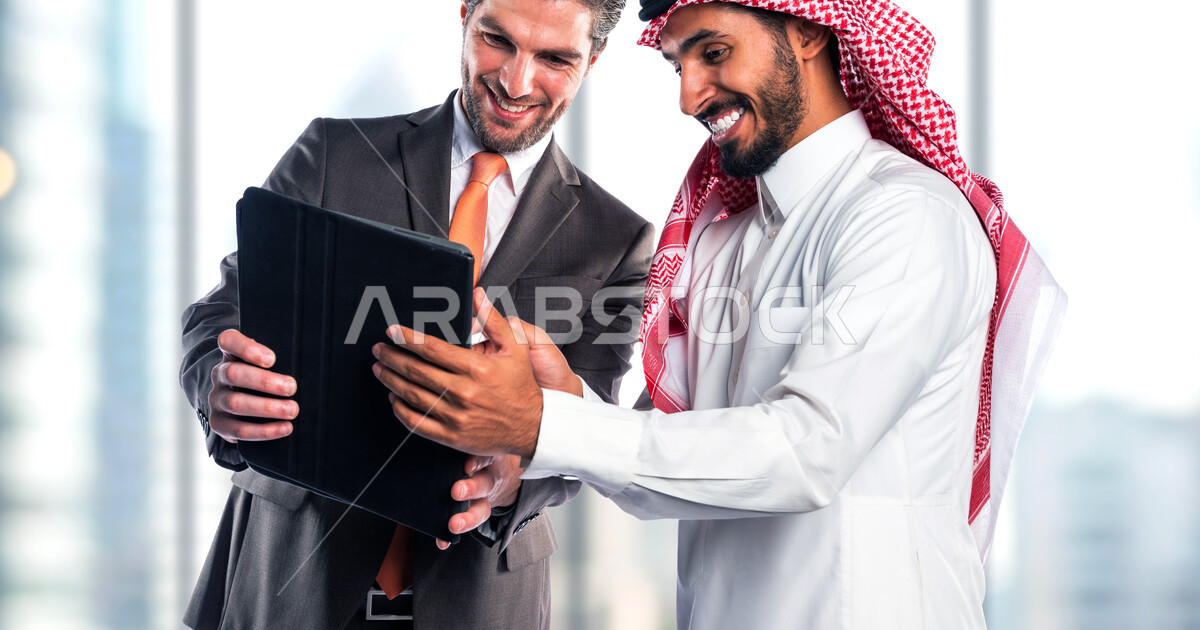 A Saudi Arabian Gulf team in a business meeting at the company’s ...