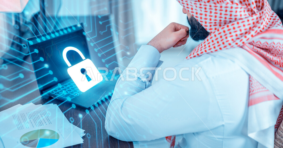 A Saudi Arabian Gulf man working on cyber security programs, computer ...