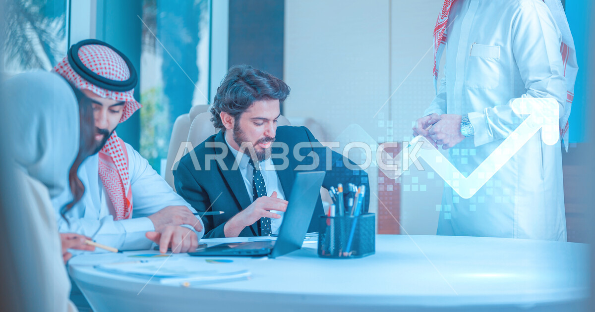 A Saudi Arabian Gulf team in a business meeting with a new client ...