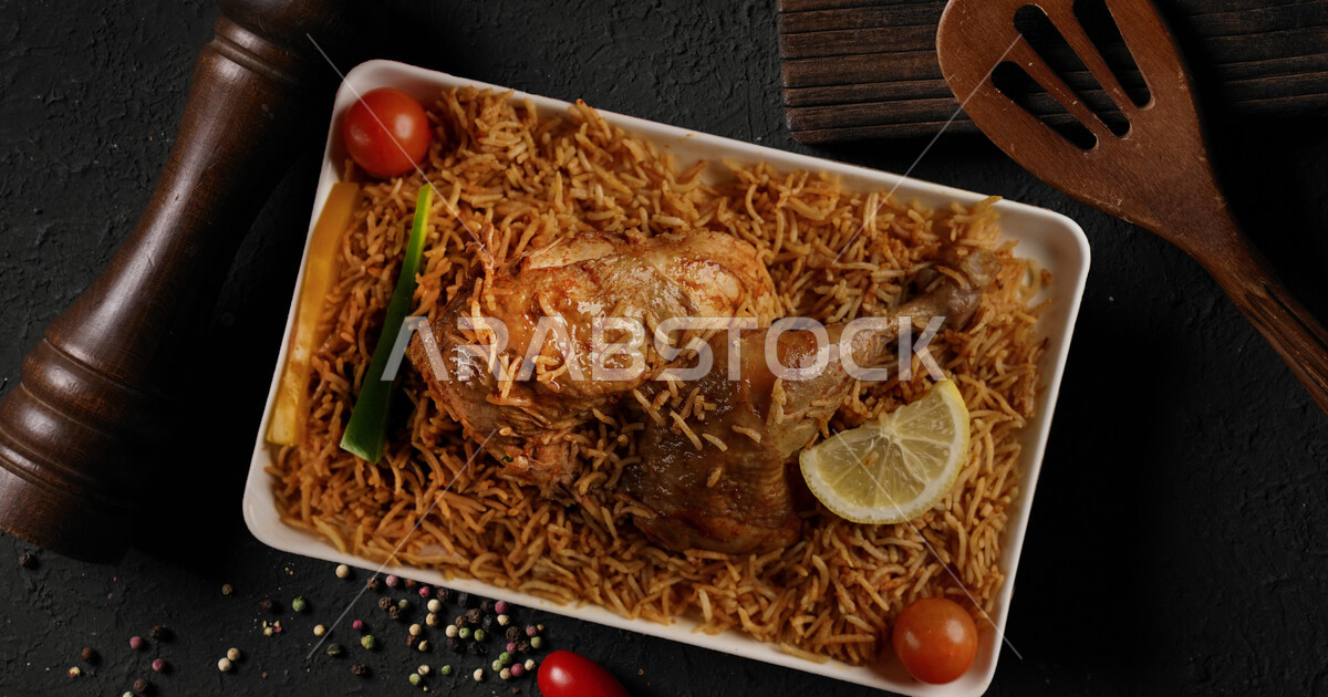 A plate of kabsa rice with meat, traditional Arab dishes, Arab food ...
