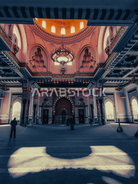 A group of worshipers inside the mosque, Islamic designs and ...
