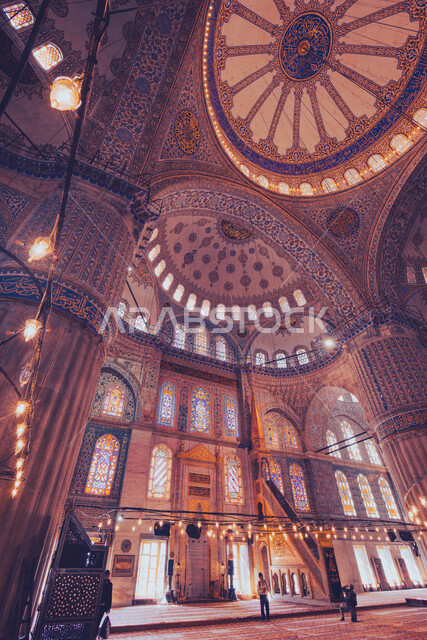 A picture from the inside of a mosque with wonderful decorations and ...