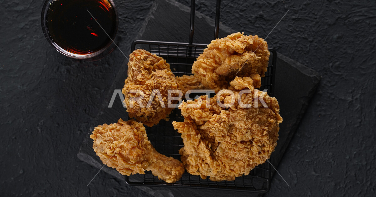 Crispy fried chicken pieces, delicious broasted chicken, Arab food and ...