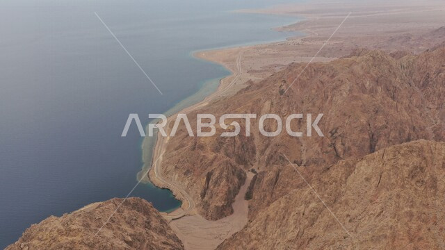 A view from the top of Tayeb Asm Beach in the north of Maqna, west of ...