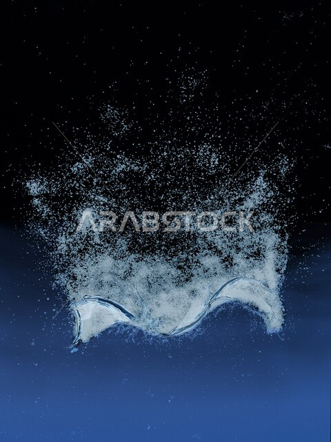 Scattered water splashes on black background, creative water splashes ...