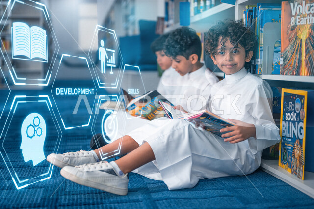 Two Saudi Arabian Gulf students studying in the school library ...