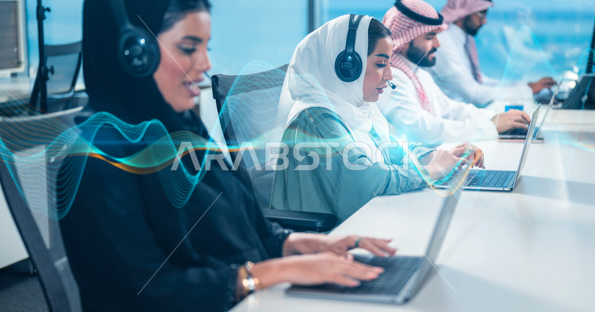 Saudi Arabian Gulf employees working in customer service inside the ...
