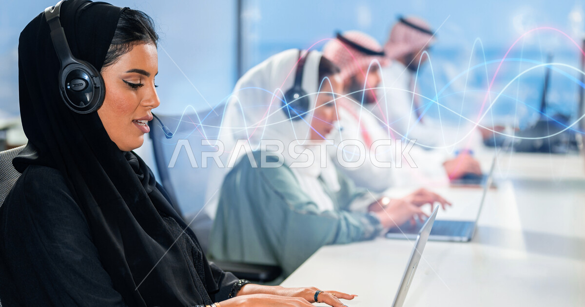 Saudi Arabian Gulf employees working in customer service inside the ...