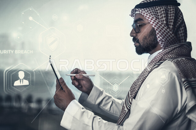 A Saudi Arabian Gulf man in traditional dress inside the company's ...