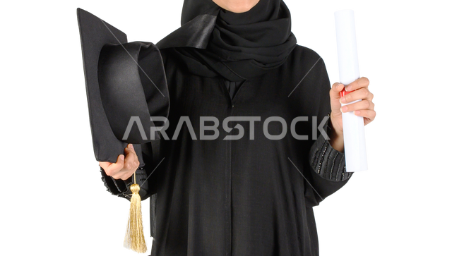 Portrait of a Saudi Arabian Gulf student wearing a black abaya holding ...