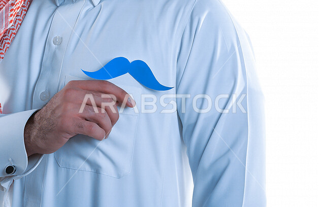 Portrait of a Saudi Arabian Gulf man wearing the traditional Saudi ...