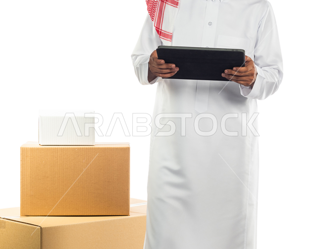 Portrait of a Saudi Arabian Gulf man working in the delivery of orders ...