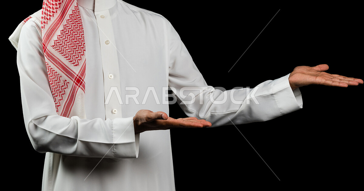 Portrait of a Saudi Arabian Gulf man in Saudi dress, hand gestures ...