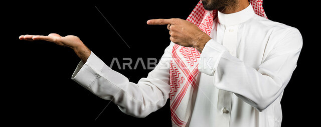 Portrait of a Saudi Arabian Gulf man wearing a Saudi dress, hand ...