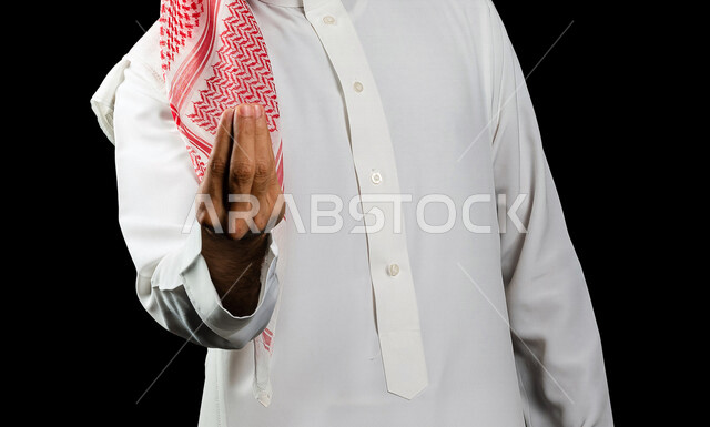 Portrait of a Saudi Arabian Gulf man wearing a Saudi dress, hand ...
