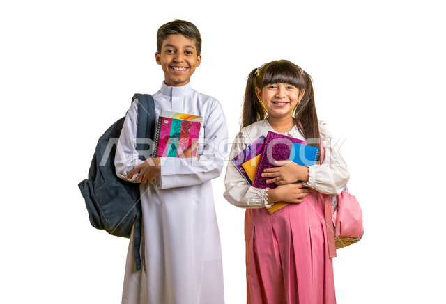 Portrait of a Saudi Arabian Gulf male and female student wearing school ...