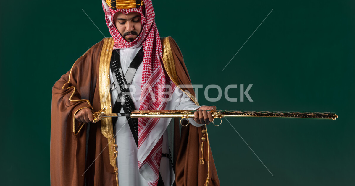 Chroma of a Saudi Arabian Gulf man wearing the Saudi bisht and holding ...