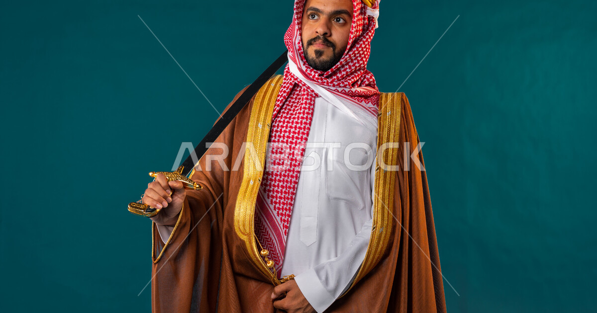Chroma of a Saudi Arabian Gulf man wearing the Saudi bisht and holding ...