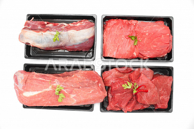 A group of fresh raw red meat ready for cooking, various livestock meat ...