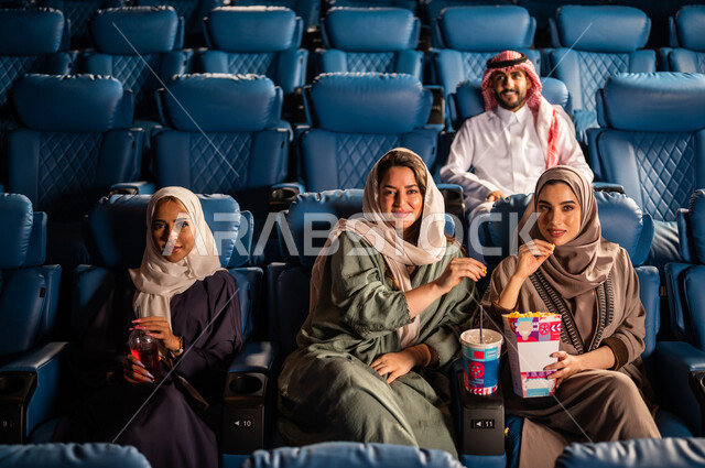 A Saudi Arabian Gulf audience in the cinema hall, a cinema hall ...