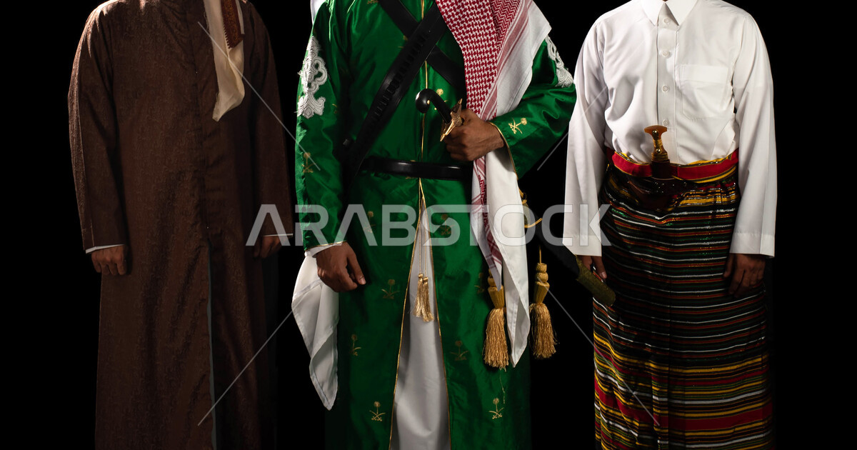 Portrait of a group of Saudi Arabian Gulf men wearing traditional Saudi ...