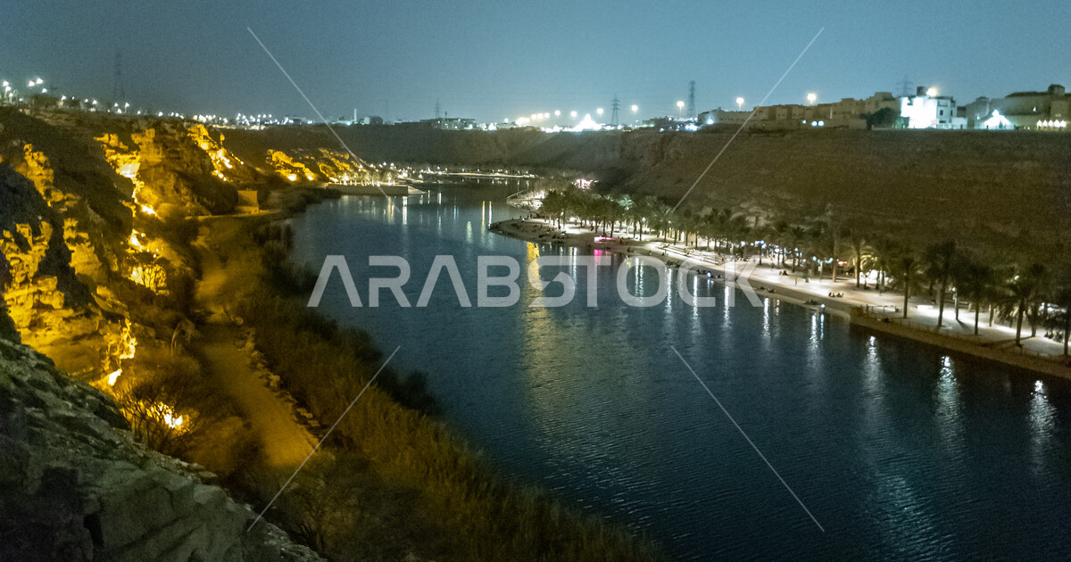 Wadi Namar Park in the city of Riyadh, Saudi Arabia at night, tourist ...