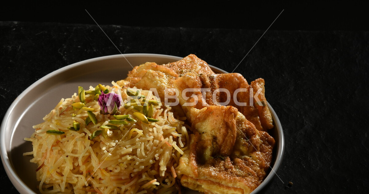 A plate of delicious rice, traditional Arab food, Arab food, popular ...