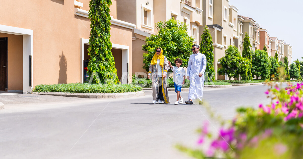 A Saudi Arabian Gulf family roaming the high-end residential ...