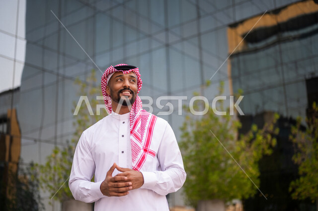 A close-up picture of a Saudi Arabian Gulf businessman wearing a Saudi ...