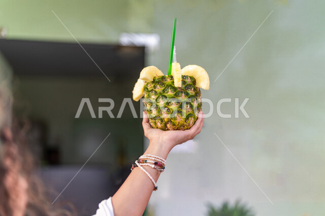 Close-up photography of the hand of a Saudi Arabian Gulf woman raising ...