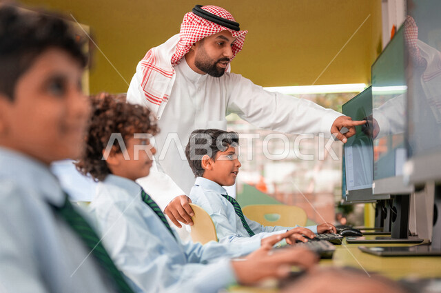 A group of Saudi Arabian Gulf students in an advanced educational ...