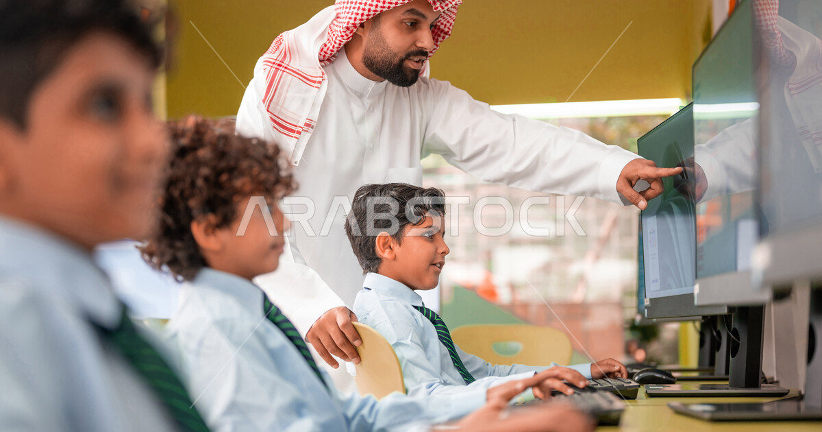 A group of Saudi Arabian Gulf students in an advanced educational ...