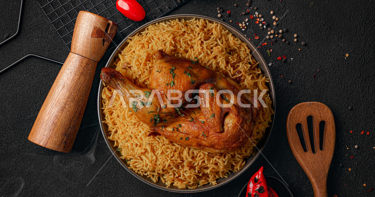 A plate of chicken kabsa rice, traditional Arab food, Arab food ...