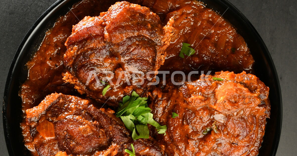 Close-up of a delicious cooked fish dish, traditional Arabic food, fish ...